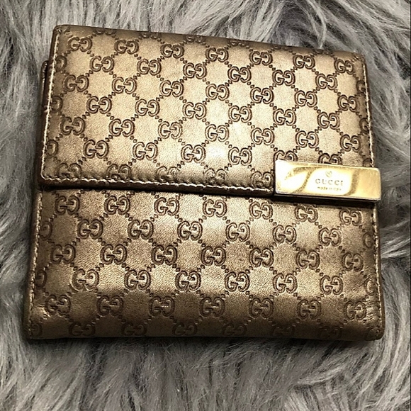 Gucci | Bags | Gucci Guccisima Large Compact Wallet In A Metallic ...
